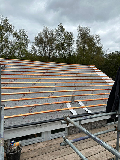 New roofs. Slate and tile roofs, Flat roofs in Manchester.